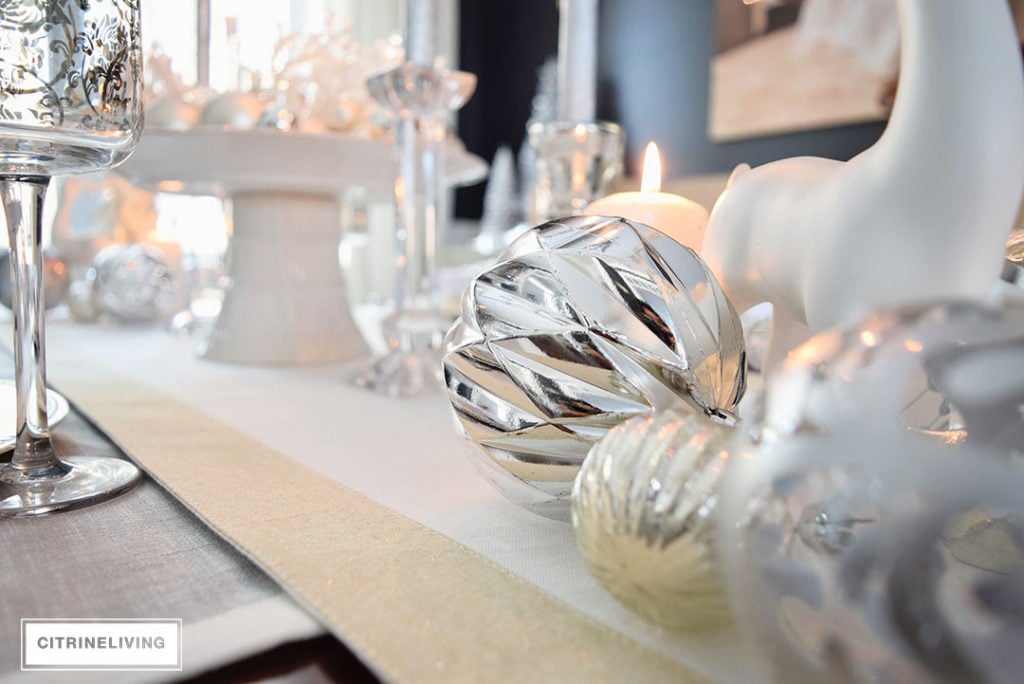 A WINTER WHITE AND SILVER HOLIDAY TABLESCAPE
