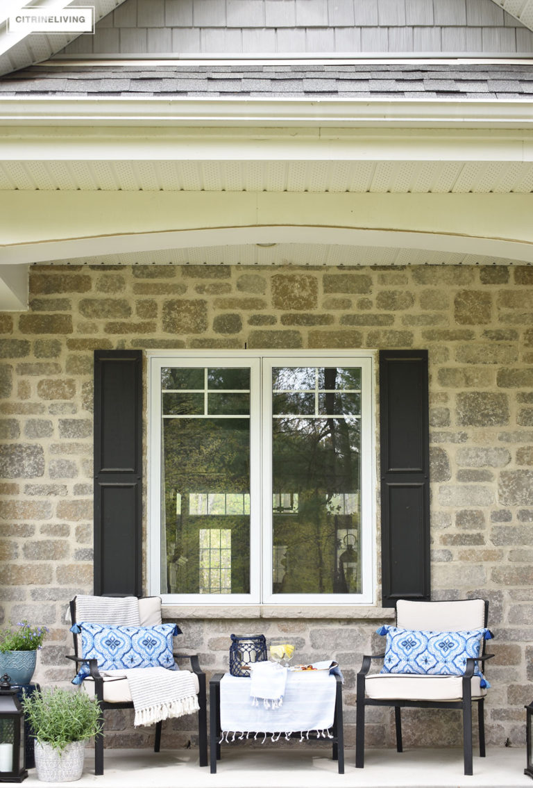 SPRING PORCH DECORATED WITH BLUE AND WHITE ACCENTS